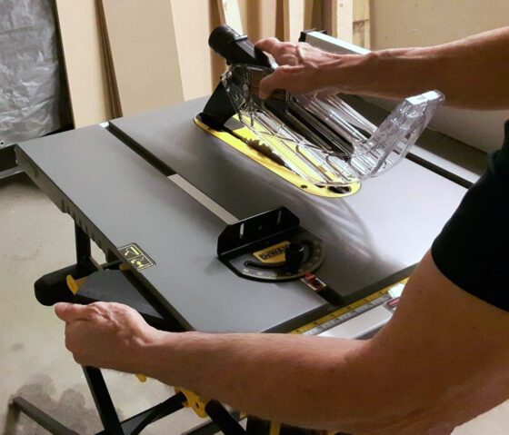 DEWALT 10″ jobsite table saw with scissors stand - Canadian Woodworking